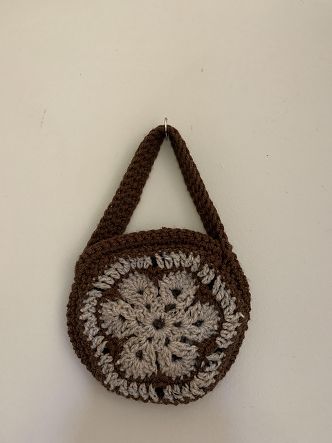 Ravelry: African Granny Flower purse pattern by James Cummins