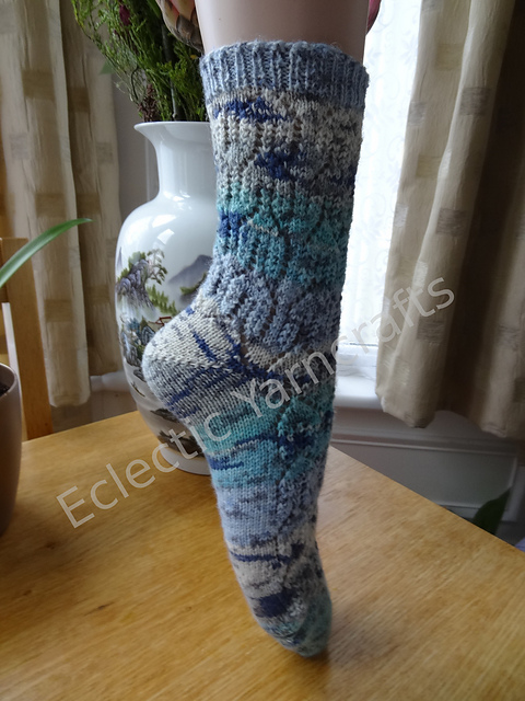 Ravelry: Lacy Short Row Toe Up Socks pattern by Eclectic Yarncrafts