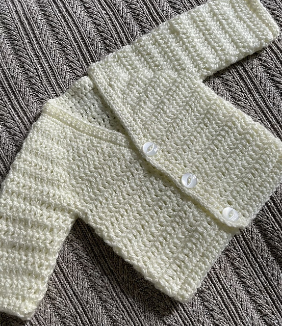 Ravelry: Ollie's Cardigan (baby) pattern by Christine Higham