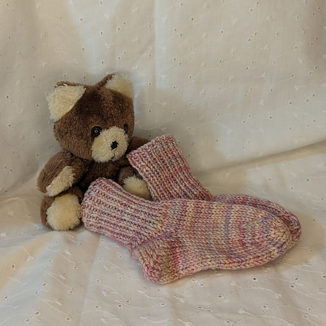 Ravelry: Tiny Foot Sweaters pattern by Taylor Rutledge
