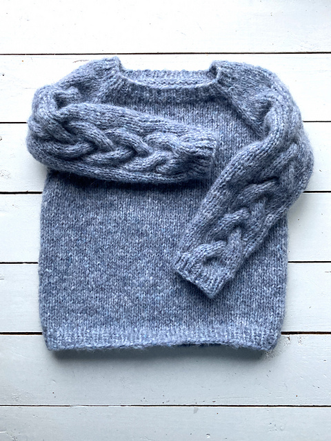 Ravelry: Kid's braid sleeve sweater pattern by Olga Lotas