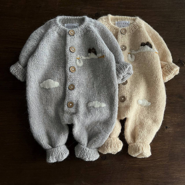 Ravelry: Onesie with a stork pattern by Marina Ayueva