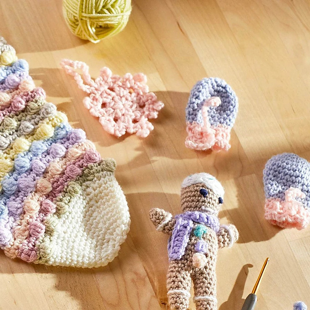 Ravelry: Baby's First Mitts pattern by Premier Yarns Design Team