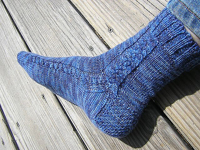 Ravelry: Aran Braid Socks for Teri pattern by Kathleen Hubbard