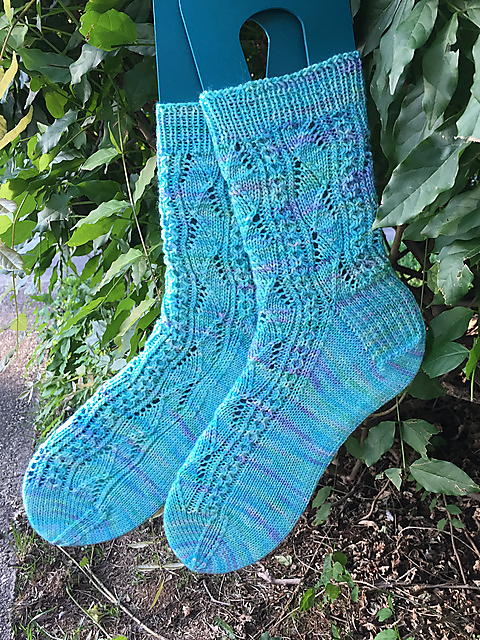 Ravelry: Dove Lace Socks (Cuff Down) pattern by Qianer Huang