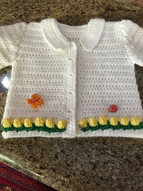Ravelry: Tulip field baby cardigan pattern by rania janbayn