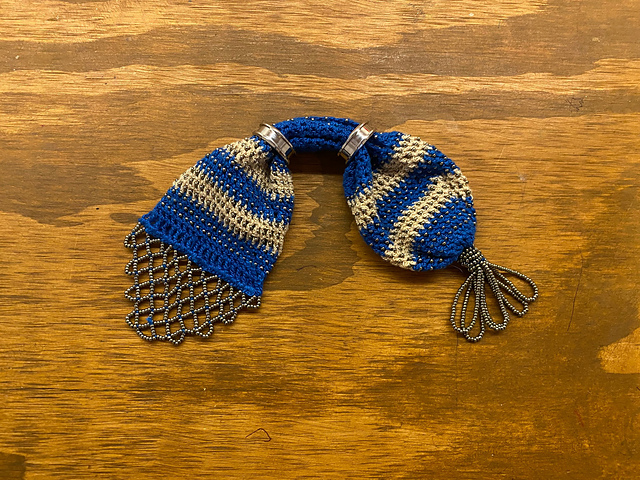 Ravelry: Striped Miser Purse pattern by Jamie Quick & Brandy Foersch