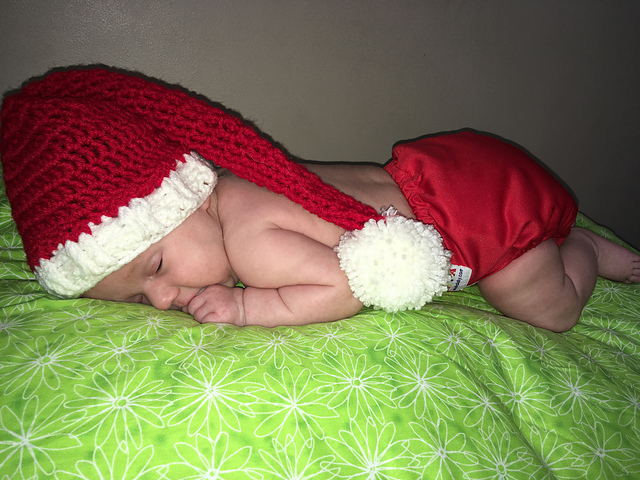 Ravelry: Baby Santa Nightcap Hat pattern by Jillian Shanahan