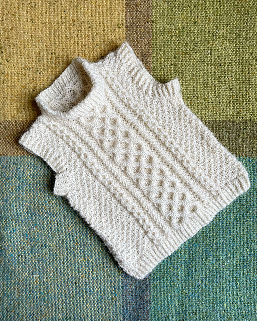Ravelry: Grá Agus Gean Traditional Irish Aran Baby Vest pattern by Ryan ...