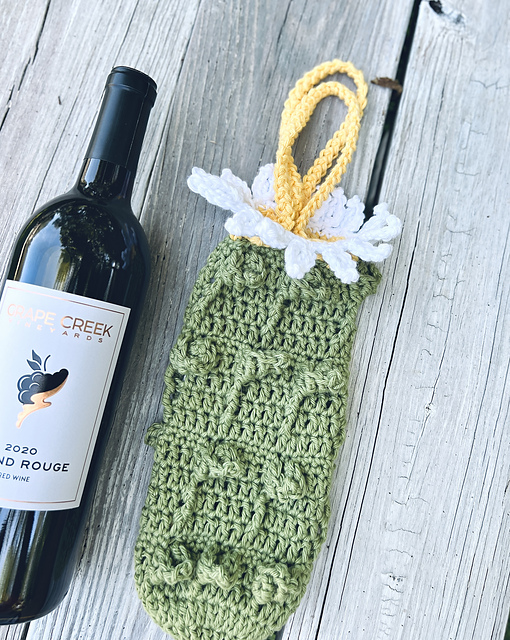 Ravelry: Daisy Wine Bottle Cozy pattern by Angie Dooley