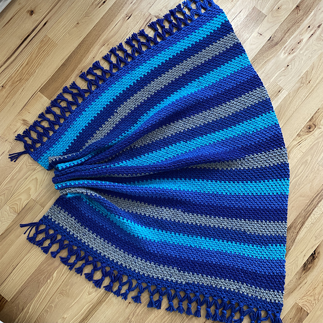 Ravelry: Caron Knotted Fringe Blanket pattern by Salena Baca