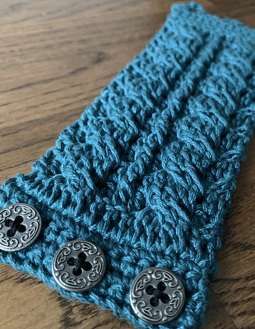 Ravelry: Cozy Cabled Cuff pattern by Sammich Stitches