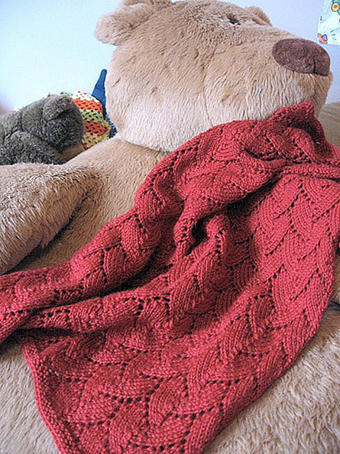Ravelry: Curlicue blanket pattern by Skruddevutt