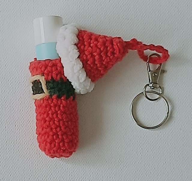 Ravelry: Santa Lip Balm Cozy Keychain pattern by May Shehab