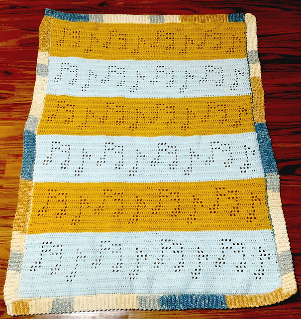 Ravelry: Musical Notes Filet Blanket pattern by Carla Gasson