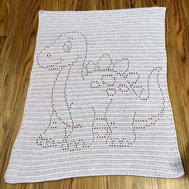 Ravelry: Chompy the Dinosaur Filet Blanket pattern by Carla Gasson