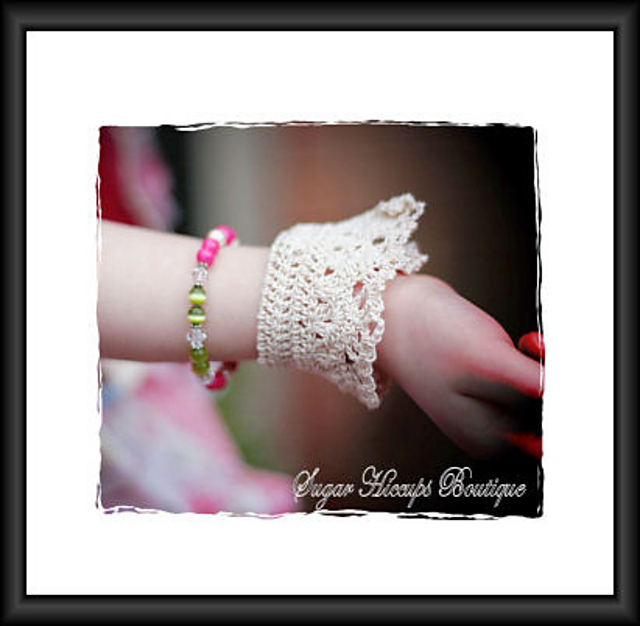 Ravelry: Girls Lace Cuffs pattern by Heather Macias