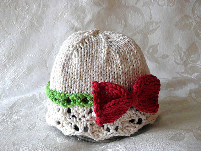Ravelry: Christmas Eyelet Baby Hat pattern by Susan Gardner