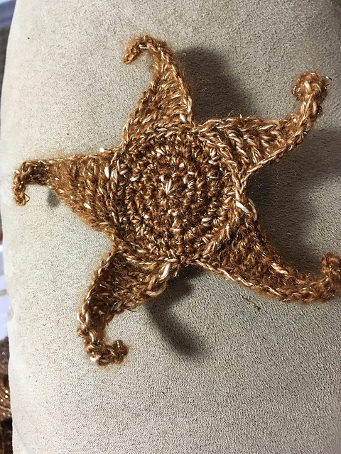 Ravelry: Curly Star Embellishment pattern by Kathryn Cole