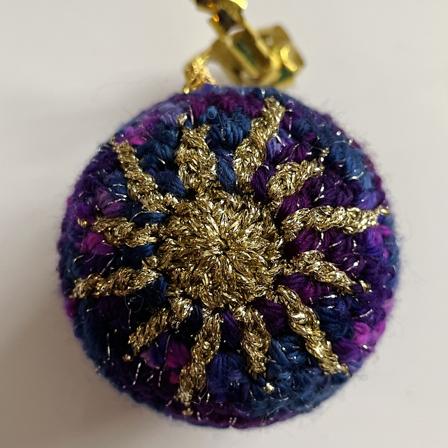 Ravelry: Celestial Solar Bauble pattern by Alice Tarry