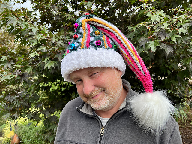 Ravelry: Jewelled Elf Bell Hat pattern by Michael Sellick