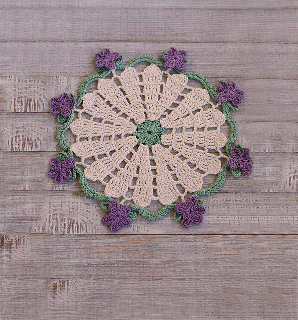 Ravelry: Spring Violets Doily pattern by Kenneth Cormier