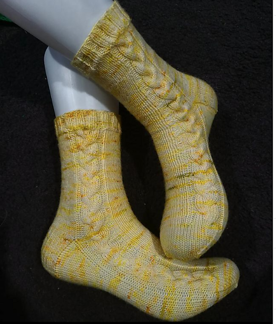 Ravelry: Braided Cable Sock pattern by Jessica Warden