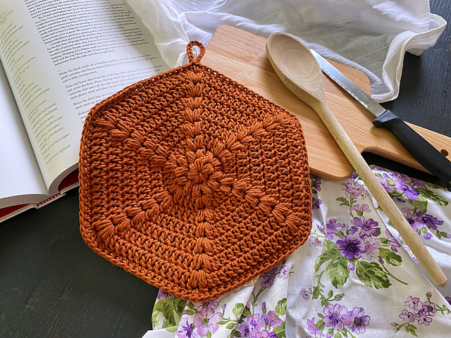 Ravelry: Flower Power Hexagon Potholder pattern by Dayna Perry