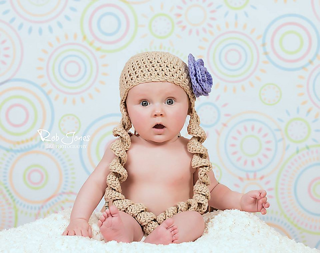 Ravelry: Hat with Twisted Tails pattern by Thomasina Cummings Designs