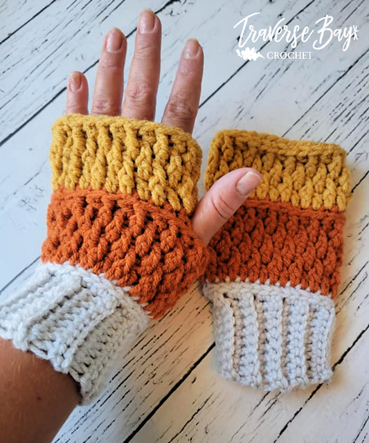Ravelry: Tri Alpine Fingerless Gloves pattern by Laura Brian