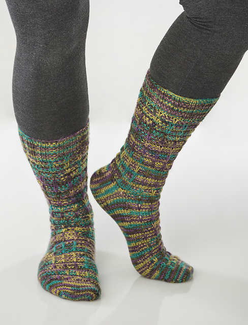 Ravelry: Banded Together Socks pattern by Universal Yarn