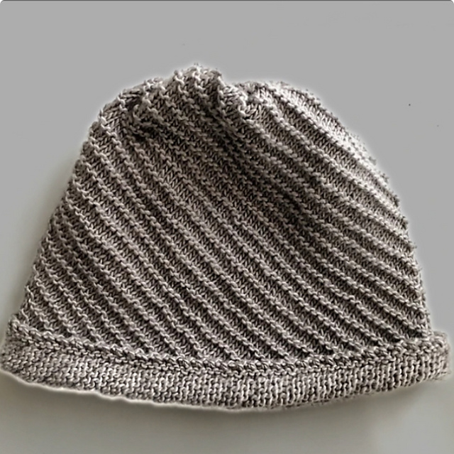 Ravelry: Diagonal Ribs Hat pattern by Wei Wilkins