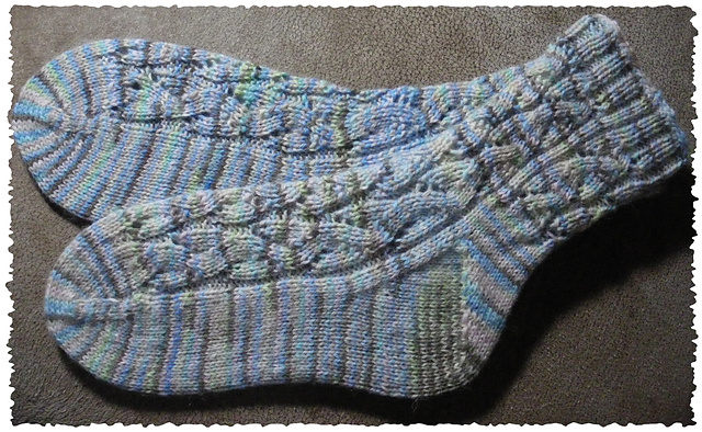 Ravelry: Mock Cable Lacy Toe Up Socks pattern by Wilma Becker