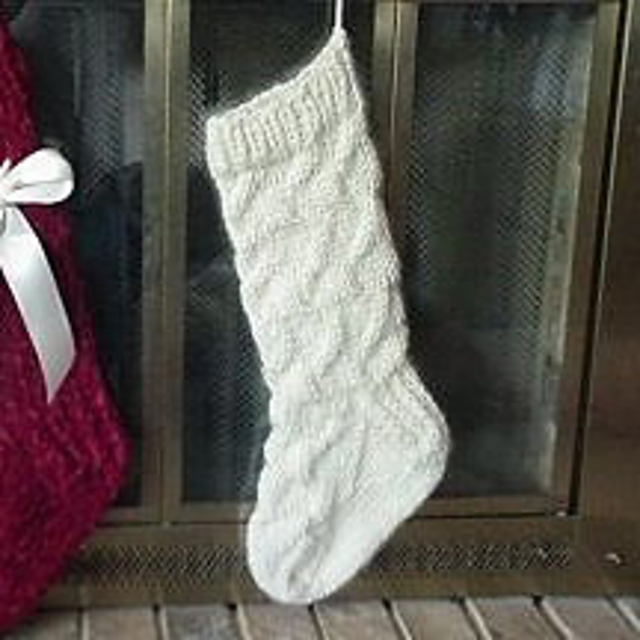Ravelry: Cabled Christmas Stocking pattern by Laura Yarnthrower