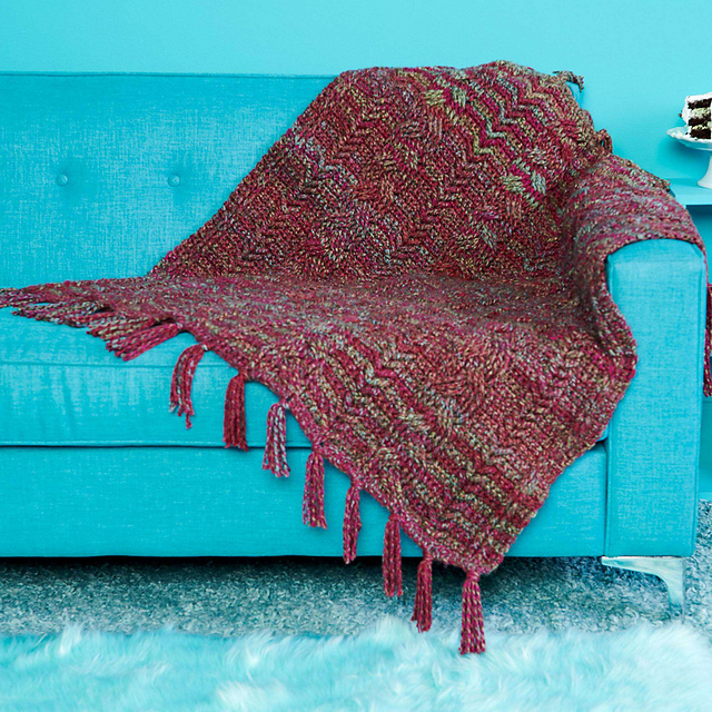 Ravelry: Woven Cables Throw pattern by Yarnspirations Design Studio