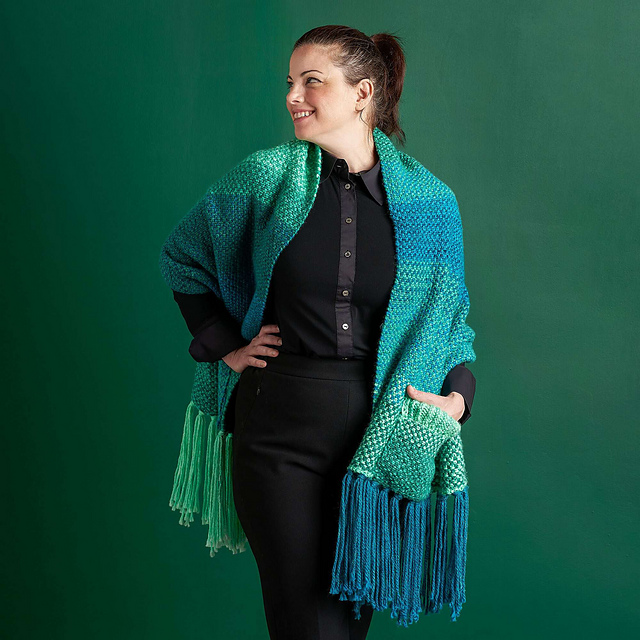 Ravelry: Fringed Pocket Shawl pattern by Caron Design Team