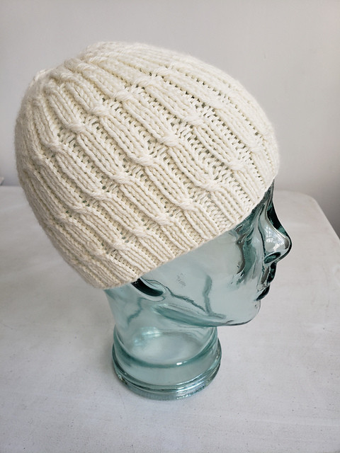 Ravelry: Jeanne's Twisted Rib Cap pattern by Carolyn Scheer