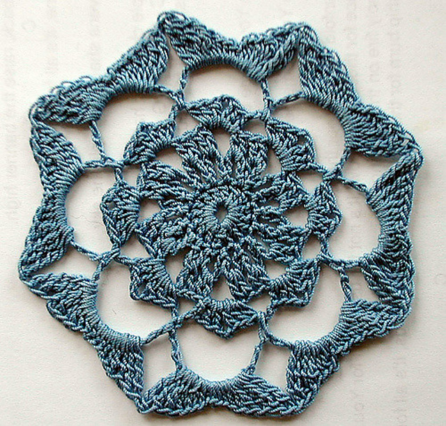 Ravelry: Floral Star Doily pattern by Andrea Moberly