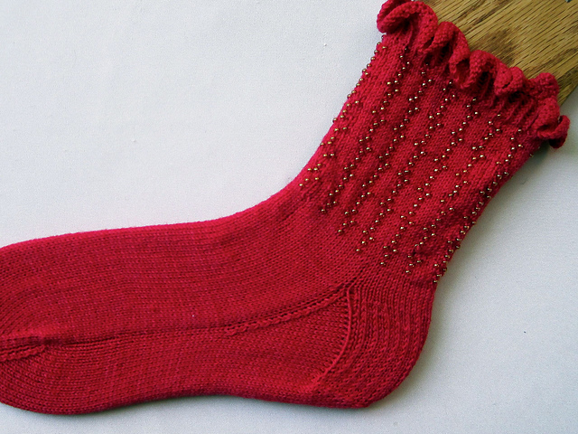 Ravelry: Beaded and Ruffled Sock pattern by Linda Lehman