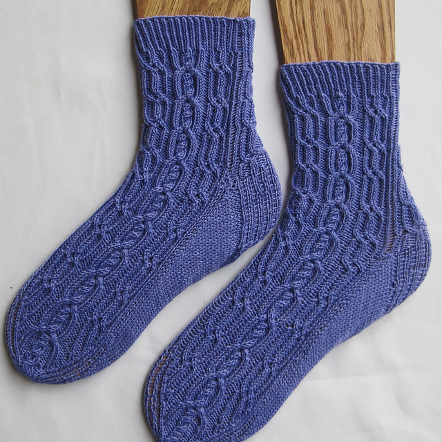 Ravelry: Montreaux Cabled Socks pattern by Linda Lehman
