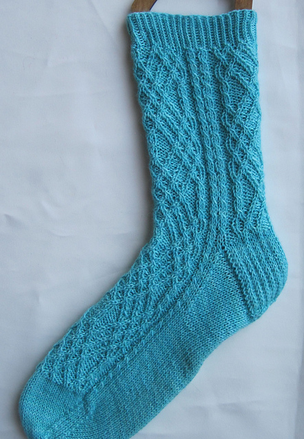 Ravelry: Moncton Cabled Socks pattern by Linda Lehman