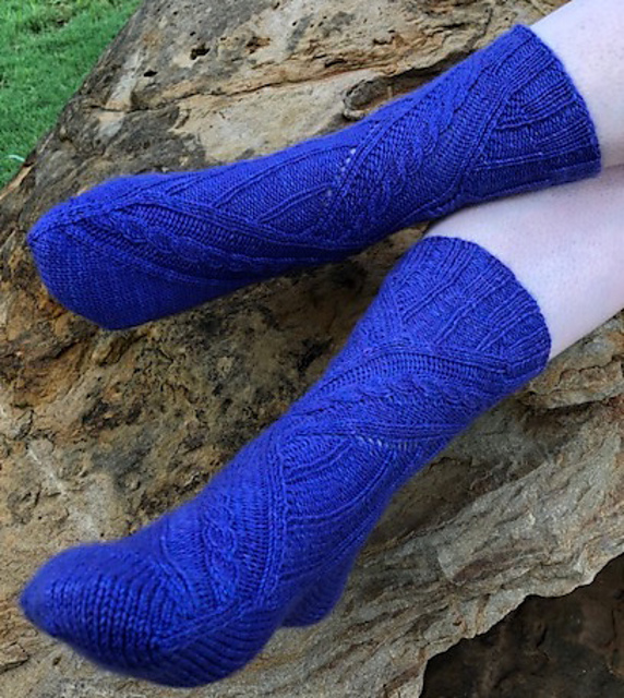 Ravelry: Clash of Cables Socks pattern by Anye M. Shafer