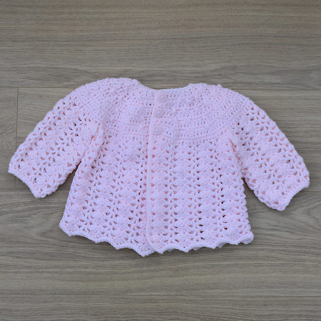 Ravelry: Baby Pretty Dotty Cardigan pattern by April Lesley