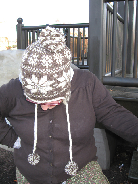 Ravelry: Rustique Snowflake Earflap Hat pattern by Julia Leeman