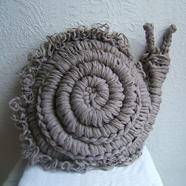 Ravelry: Colin The Snail Cushion Cover pattern by Lorraine Hearn