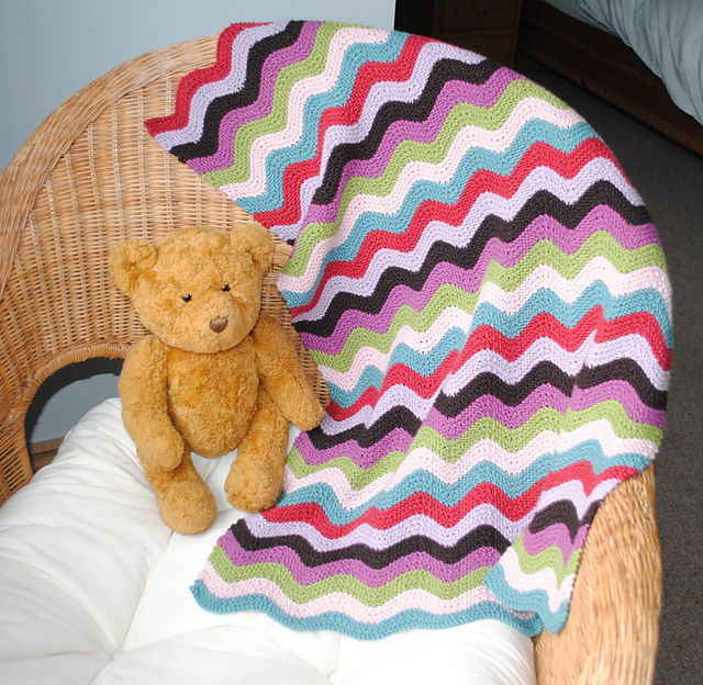Ravelry: Cosine Ripple Baby Blanket pattern by Sam Godden