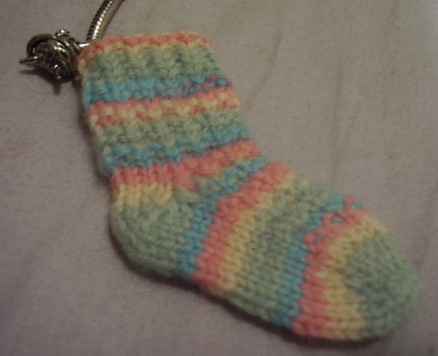 Ravelry: Toe Up Magic Loop Wee Tiny Sock Swap Sock pattern by Sean Higgins
