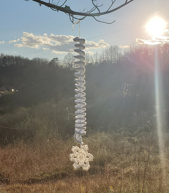 Ravelry: Christmas Snowflake Wind Spinner pattern by Charlotte Abraham
