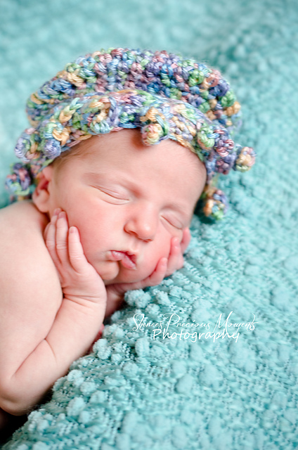 Ravelry: 731 Curly Cue Hat pattern by Sandy Powers