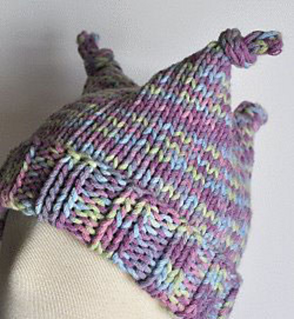 Ravelry: Tri-Cornered Baby Hat pattern by Cathy Campbell